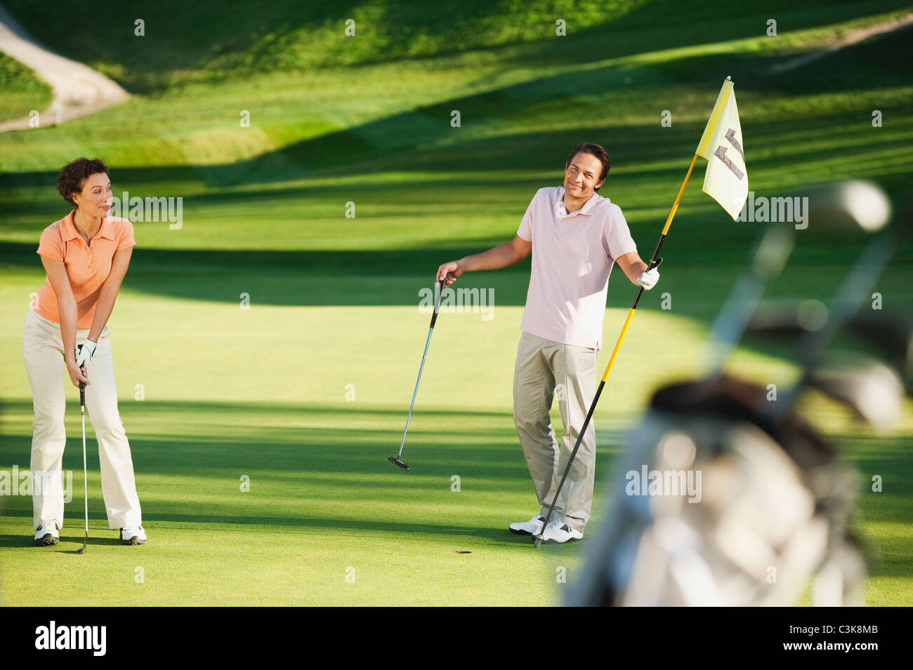Italy, Kastelruth, Golfers on golf course Stock Photo - Alamy