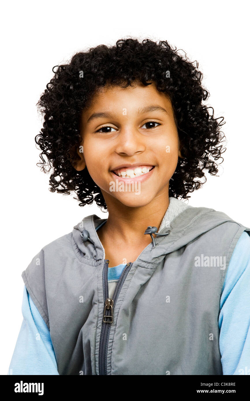 Latin American boy smiling isolated over white Stock Photo - Alamy