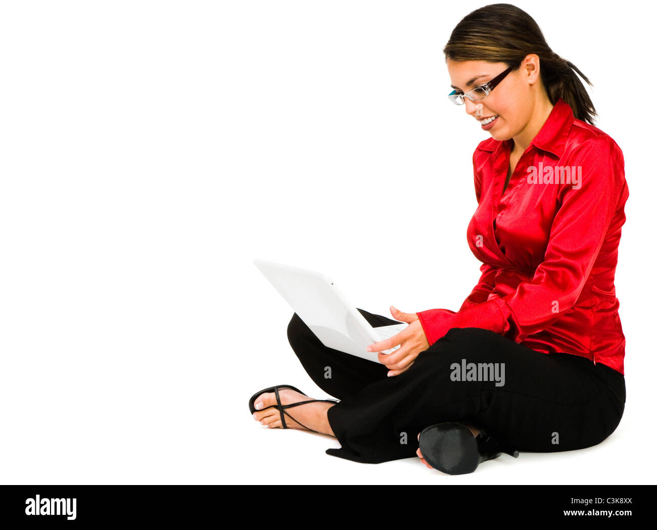 Fashion model using a laptop isolated over white Stock Photo - Alamy