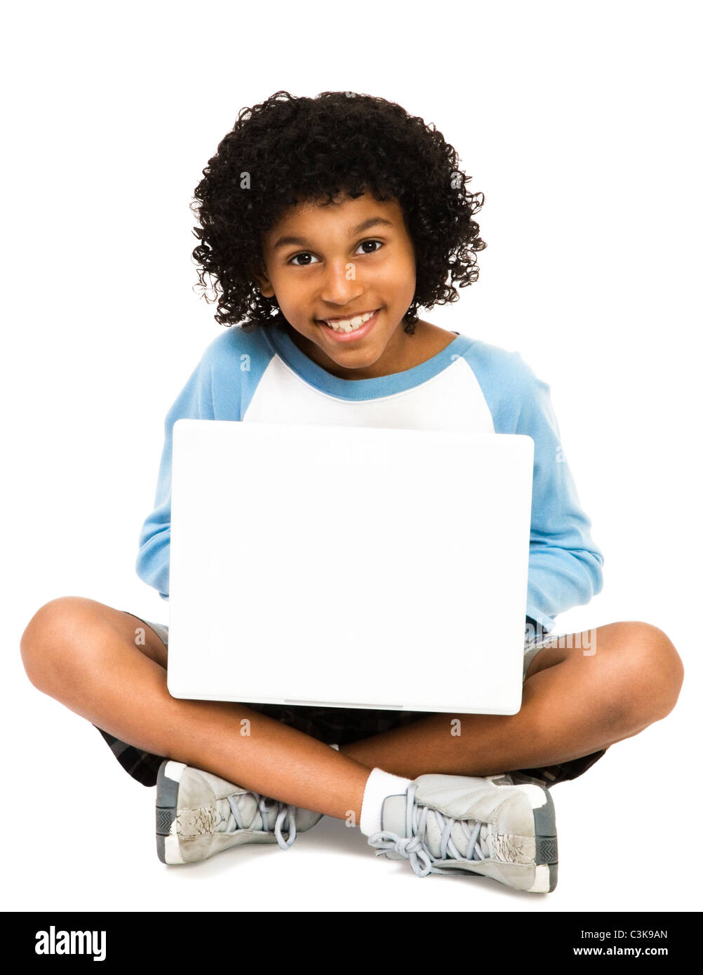 Boy using computer learning Cut Out Stock Images & Pictures - Alamy