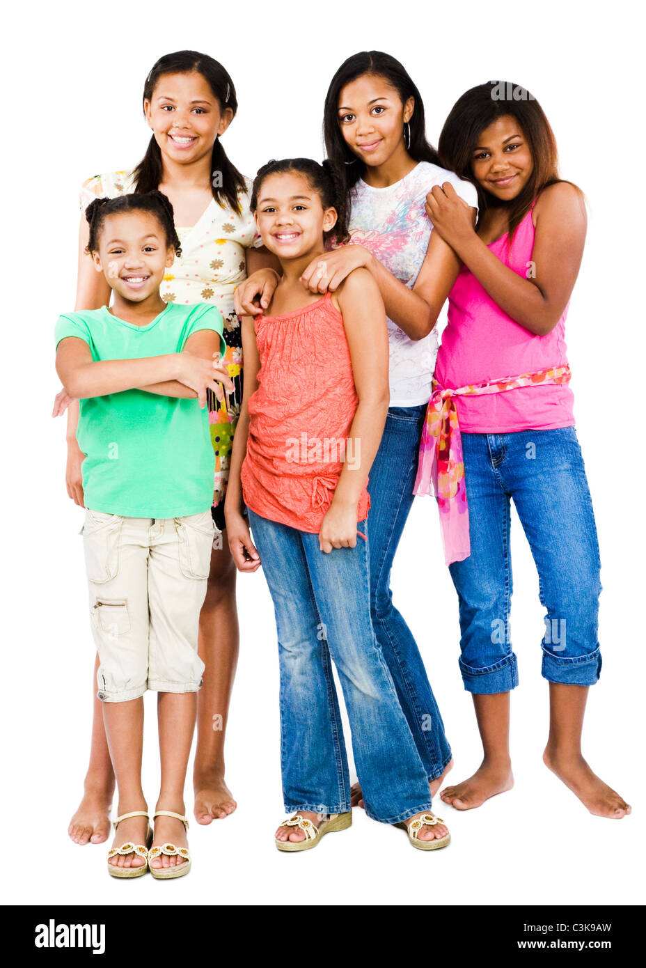 Portrait of five friends standing together isolated over white Stock ...