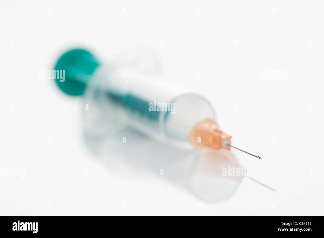 Syringe on white background Stock Photo - Alamy