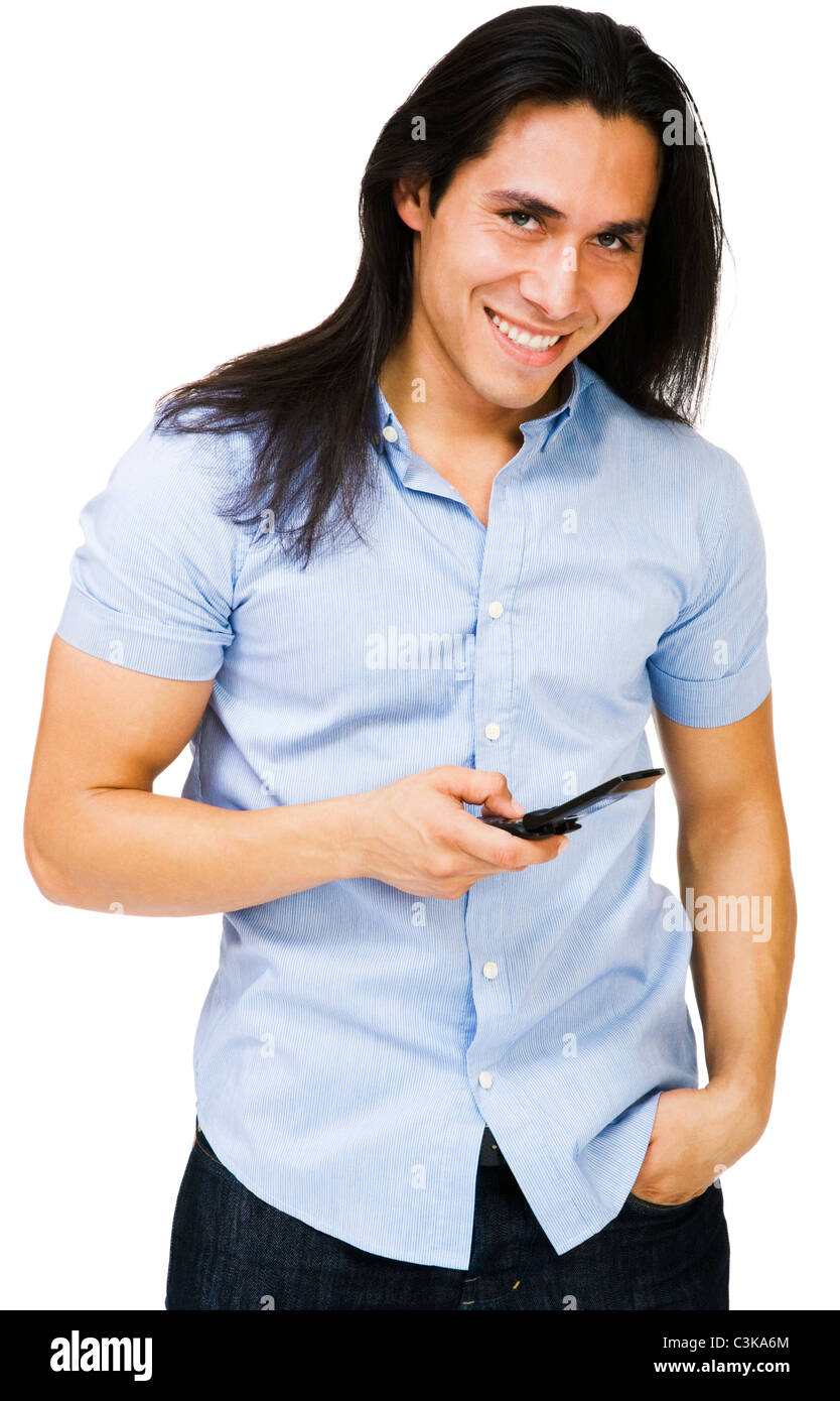 Happy man text messaging on a mobile phone isolated over white Stock ...