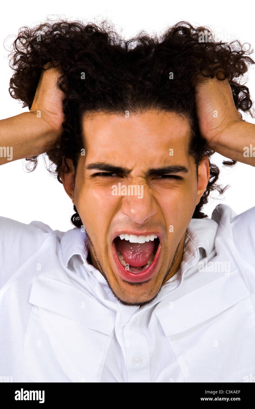 Angry man shouting and posing isolated over white Stock Photo - Alamy