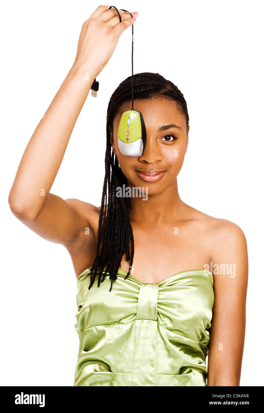 Teenager holding a computer mouse and smiling isolated over white Stock ...