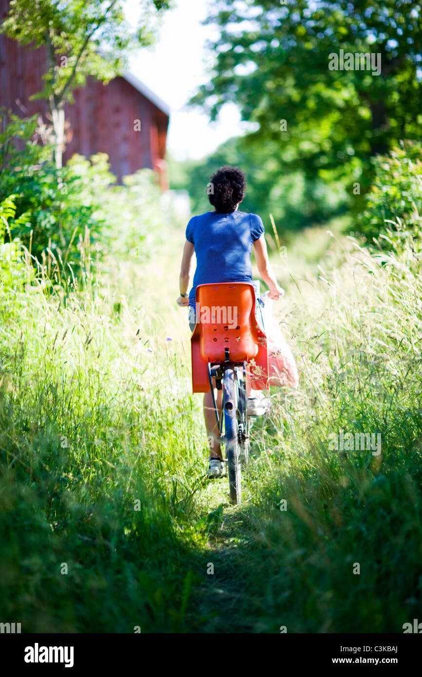 Cycling through grass hi-res stock photography and images - Alamy
