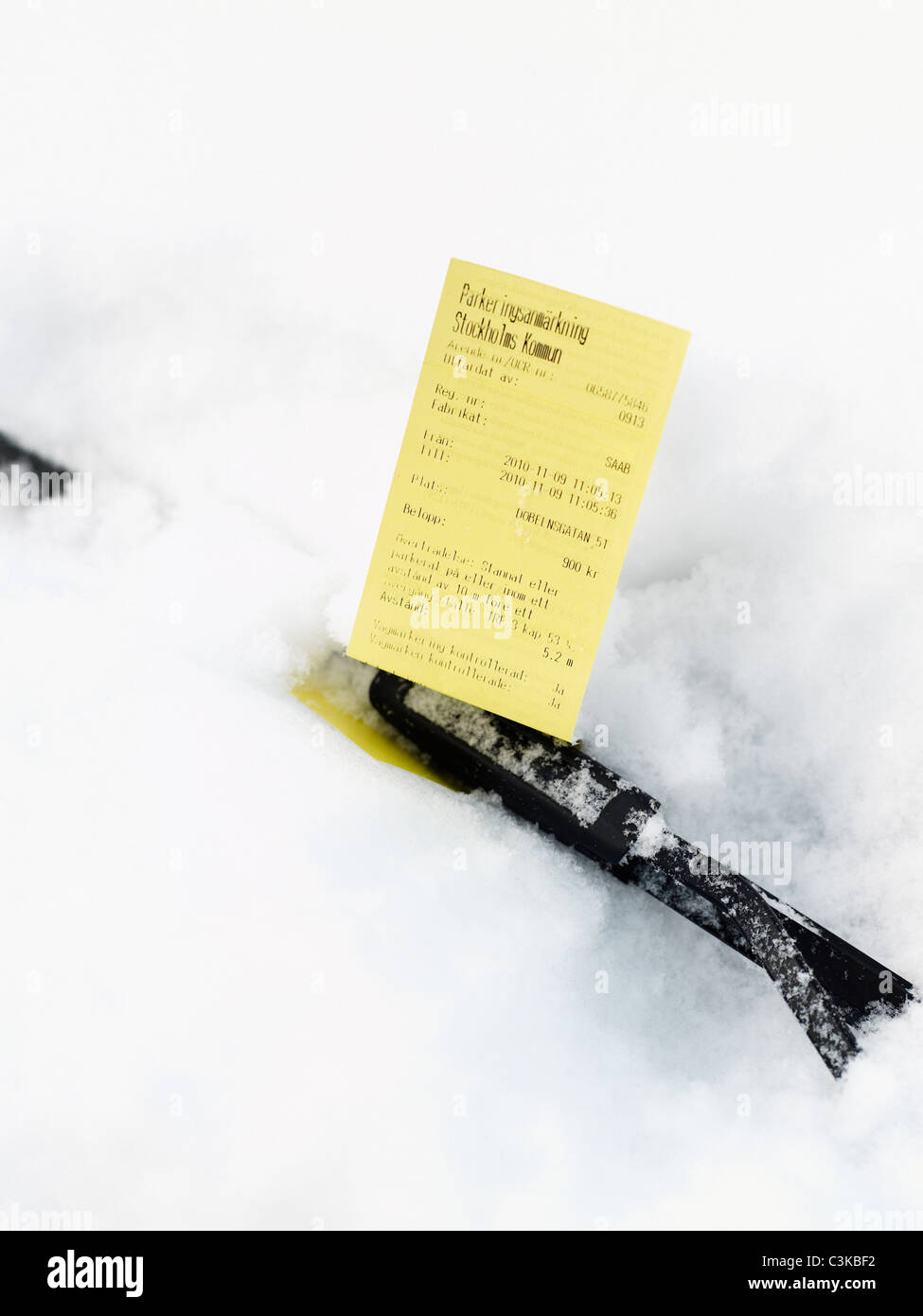 Parking ticket behind windshield wiper Stock Photo - Alamy