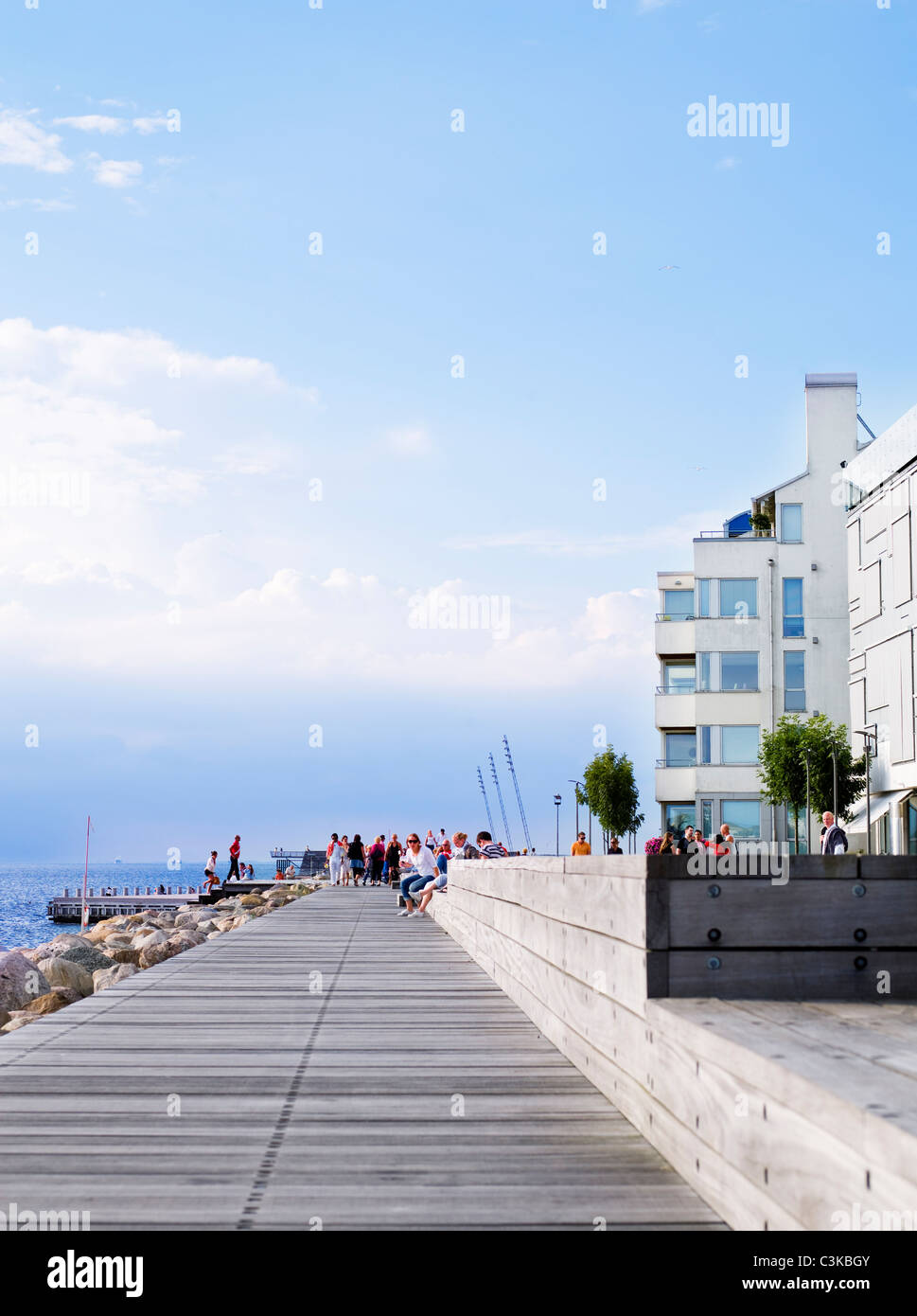 Waterfront with wooden promenade Stock Photo - Alamy