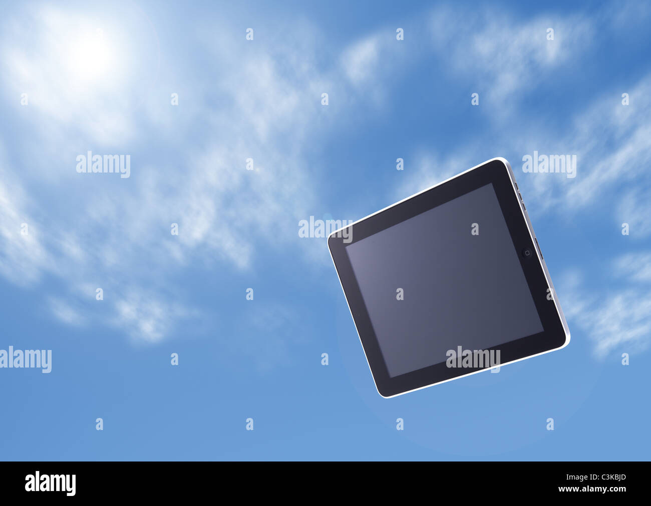 Tablet PC and blue sky Stock Photo - Alamy