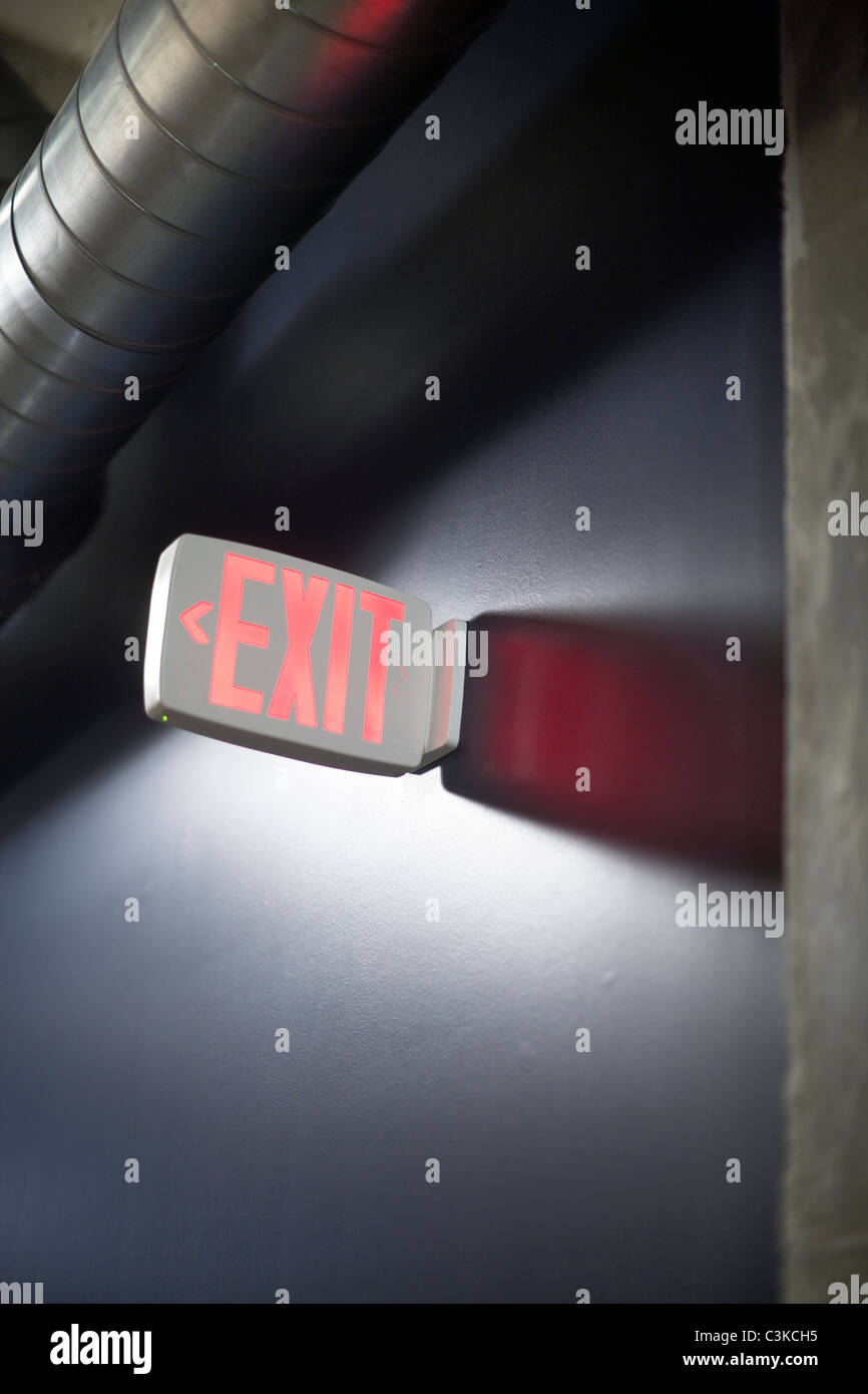Exit sign in corridor Stock Photo - Alamy