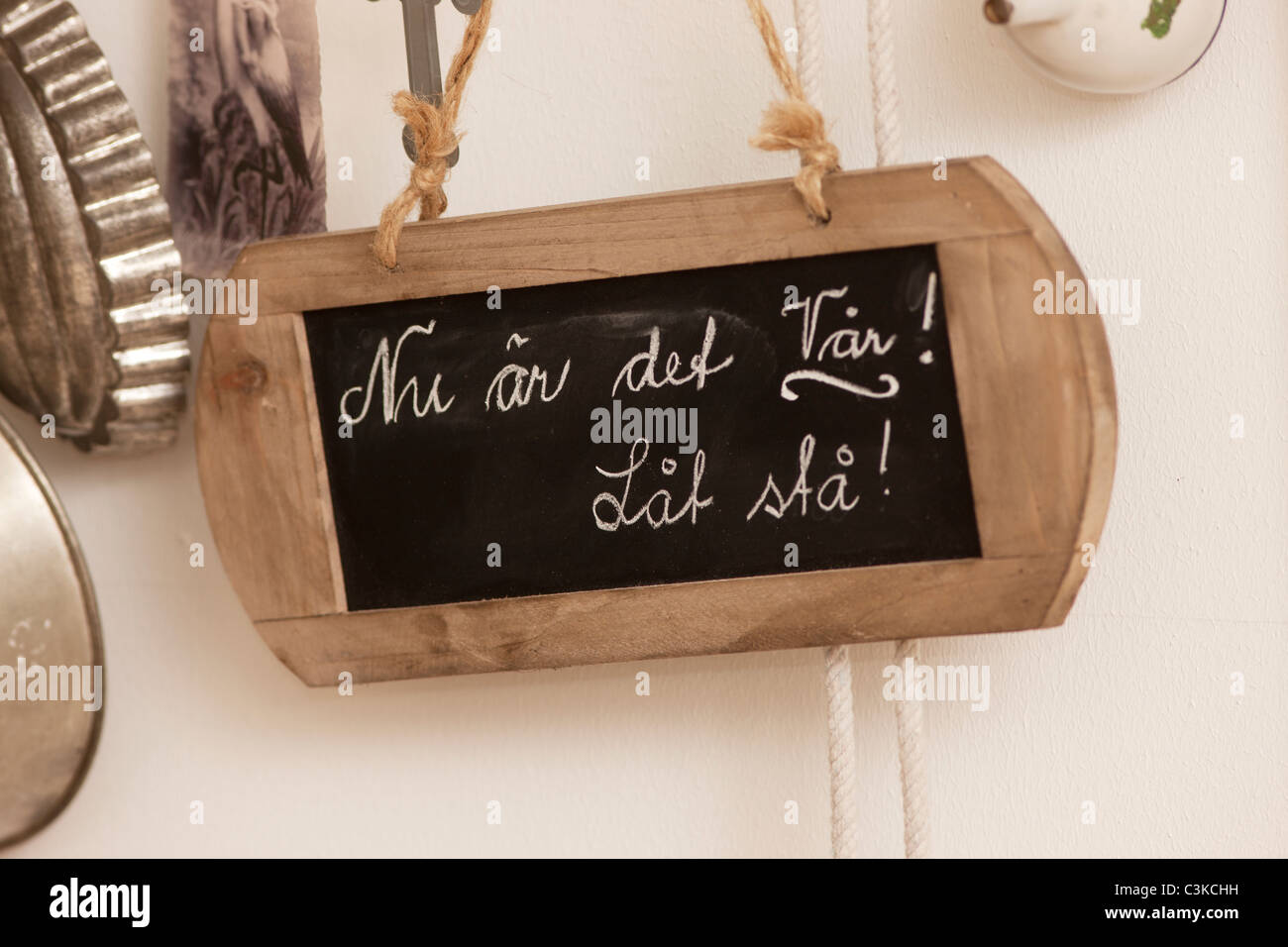 Small wooden board with chalk handwriting Stock Photo - Alamy