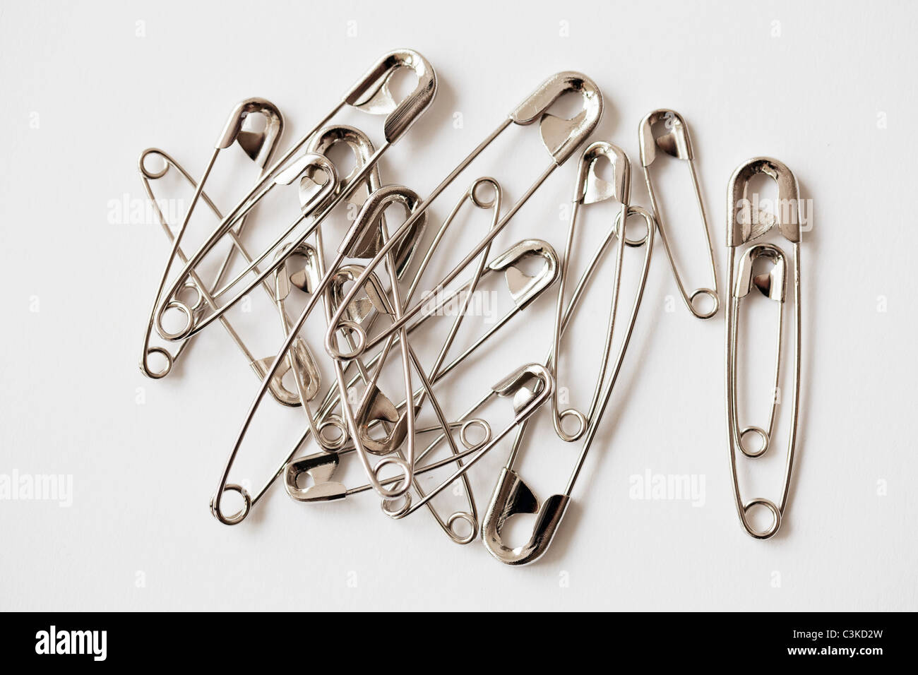 Safety pins hi-res stock photography and images - Alamy