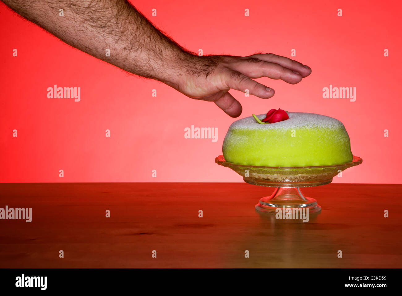 Human hand reaching to take dessert hi-res stock photography and images ...