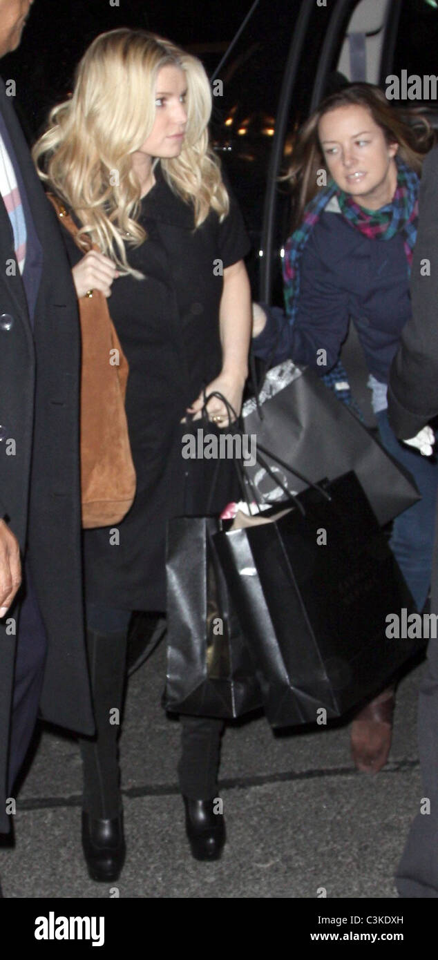 Singer Jessica Simpson with her personal assistant outside the Ritz ...