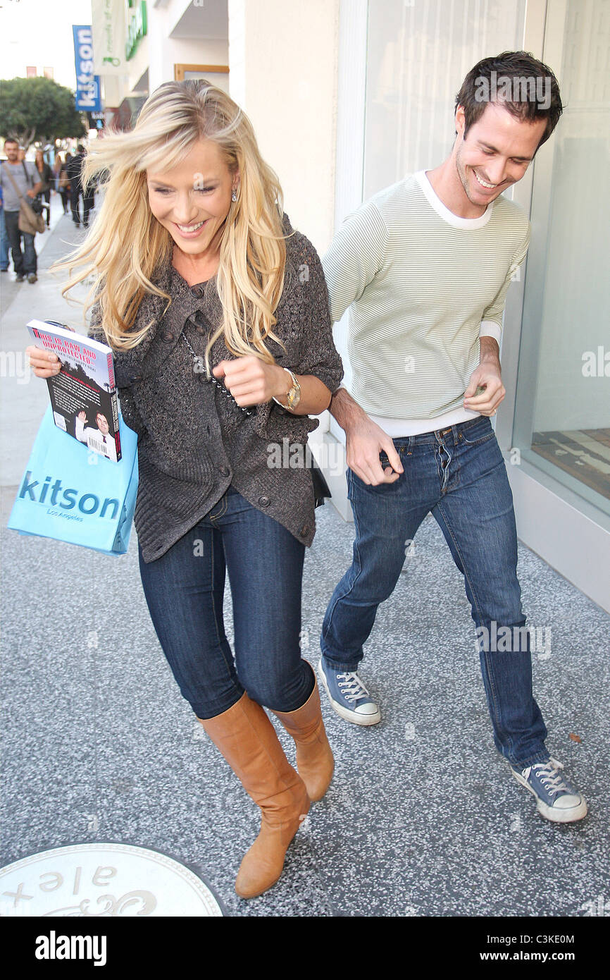 Dexter' actress Julie Benz carrying Perez Hilton's new book, leaves ...