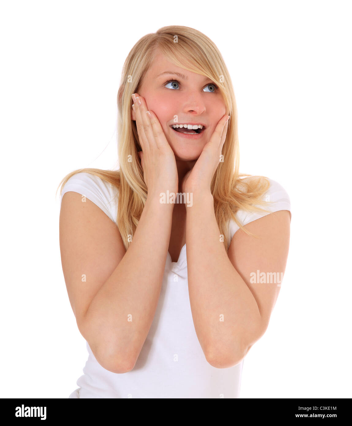Happily surprised girl. All on white background Stock Photo - Alamy