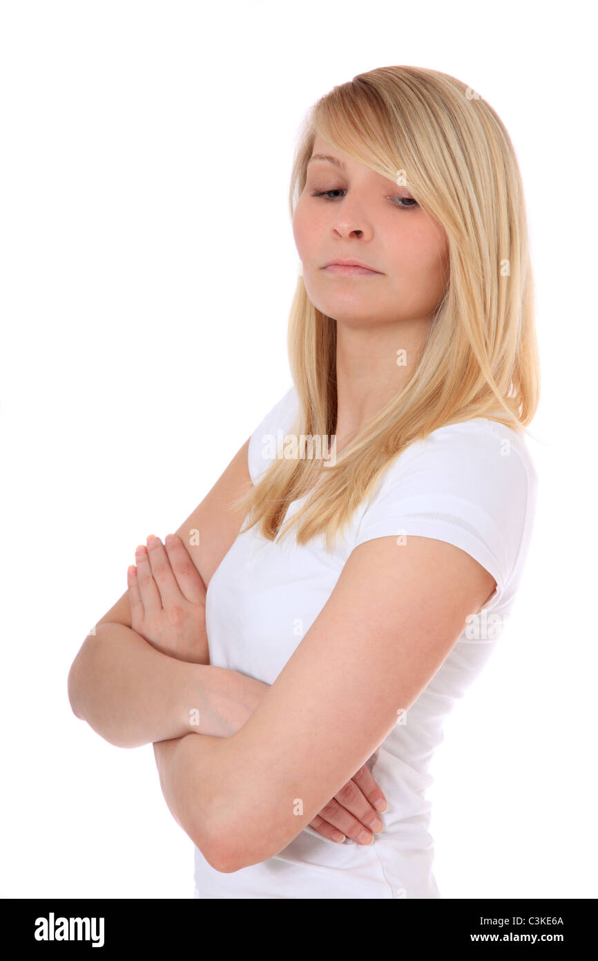 Attractive young woman with sceptical look. All on white background ...