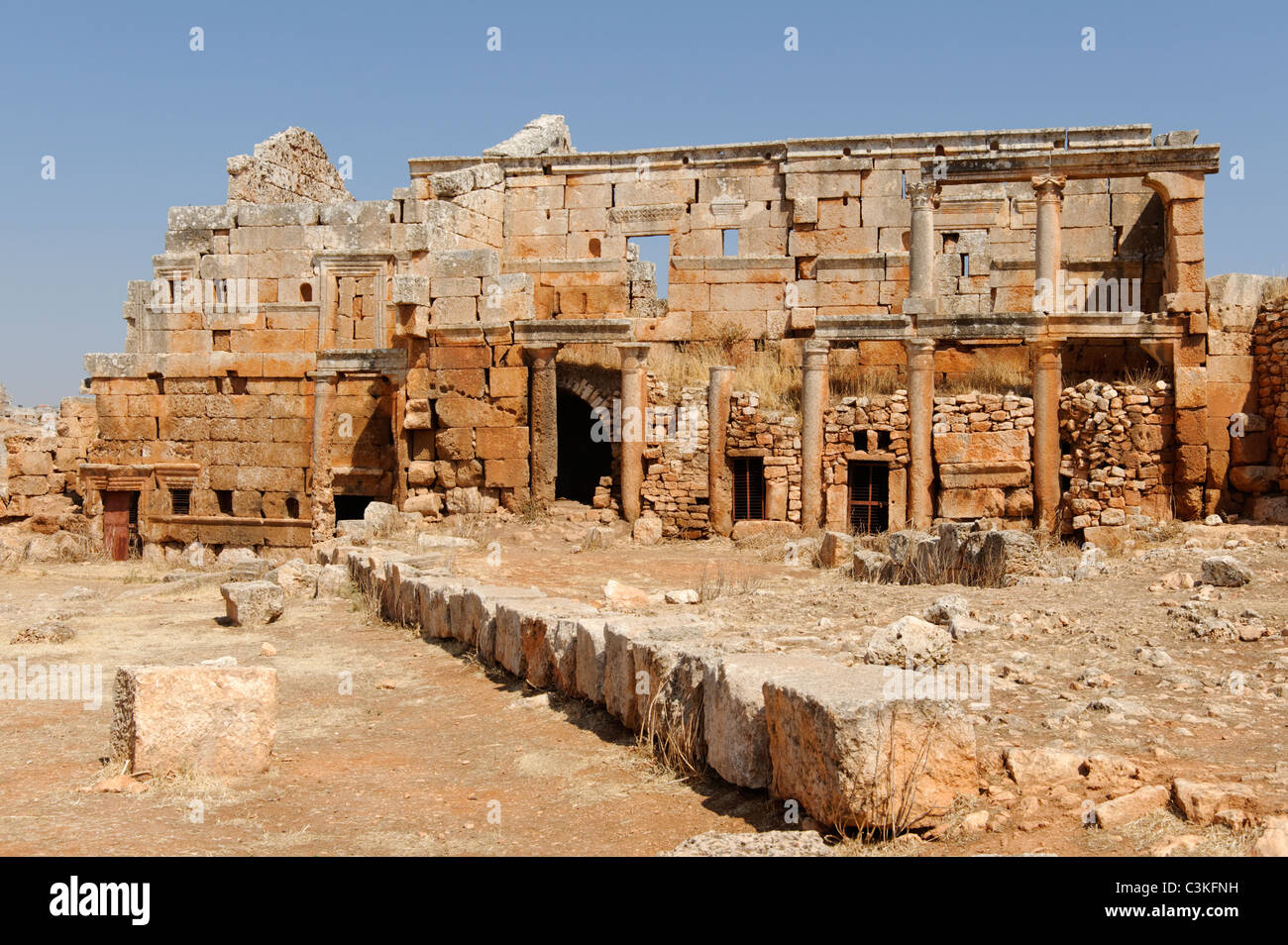 View of the colonnaded facade of a double fronted villa at the Dead ...