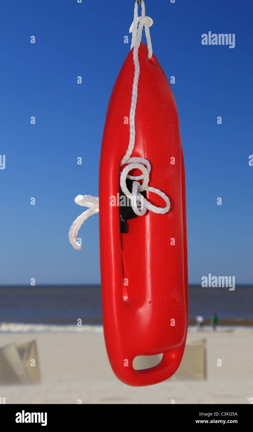 Red life buoy at the beach Stock Photo - Alamy
