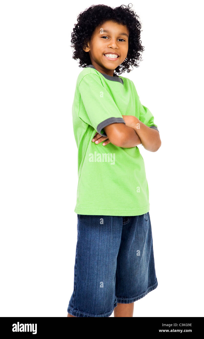 Happy boy standing with her arms crossed isolated over white Stock ...