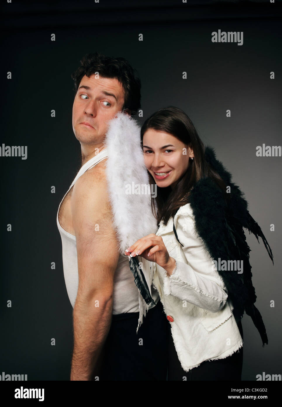 Mr. Angel and Mrs. Angel. Creepy character portrait Stock Photo - Alamy