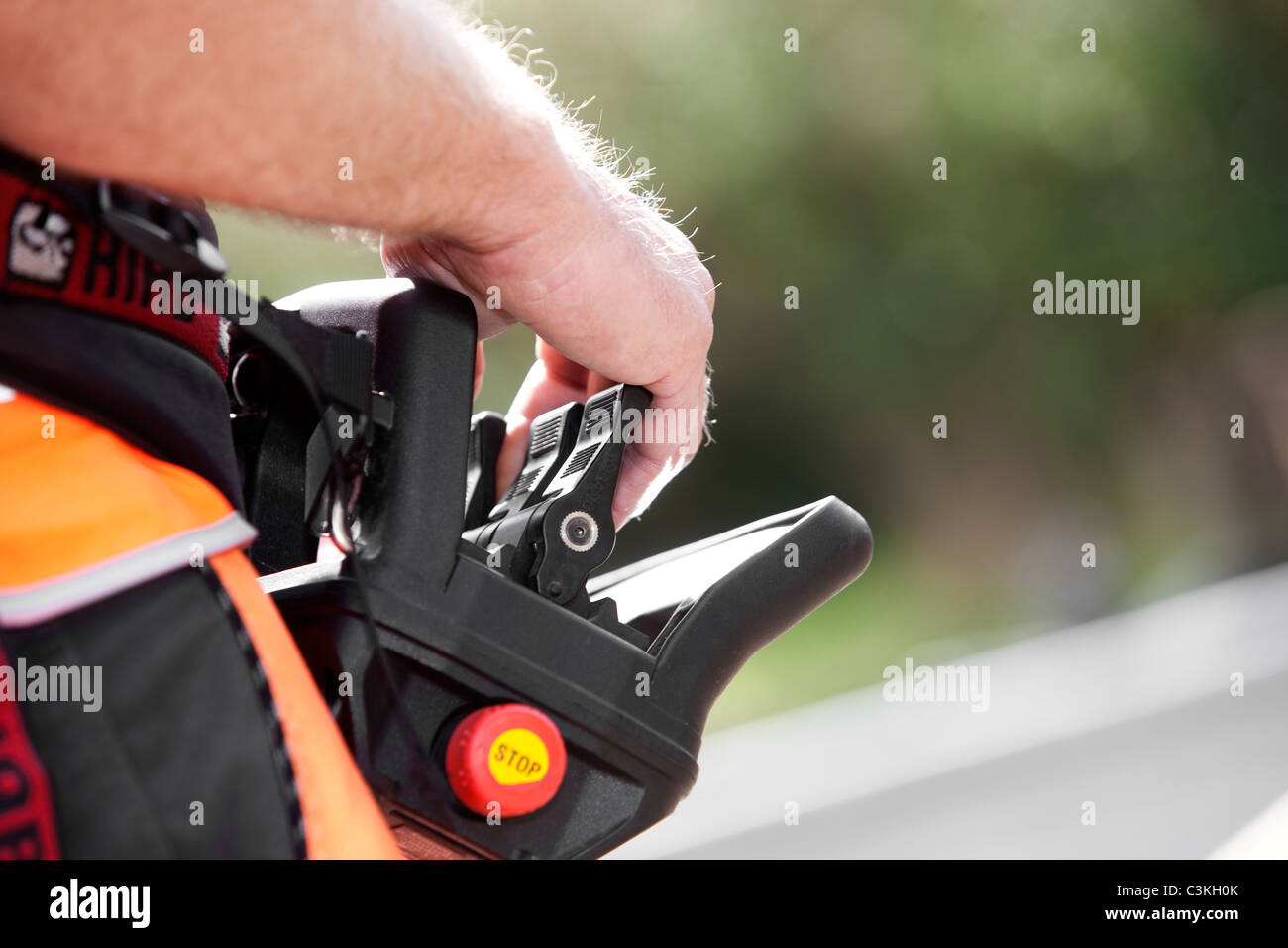 Midsection of man carrying equipment Stock Photo - Alamy