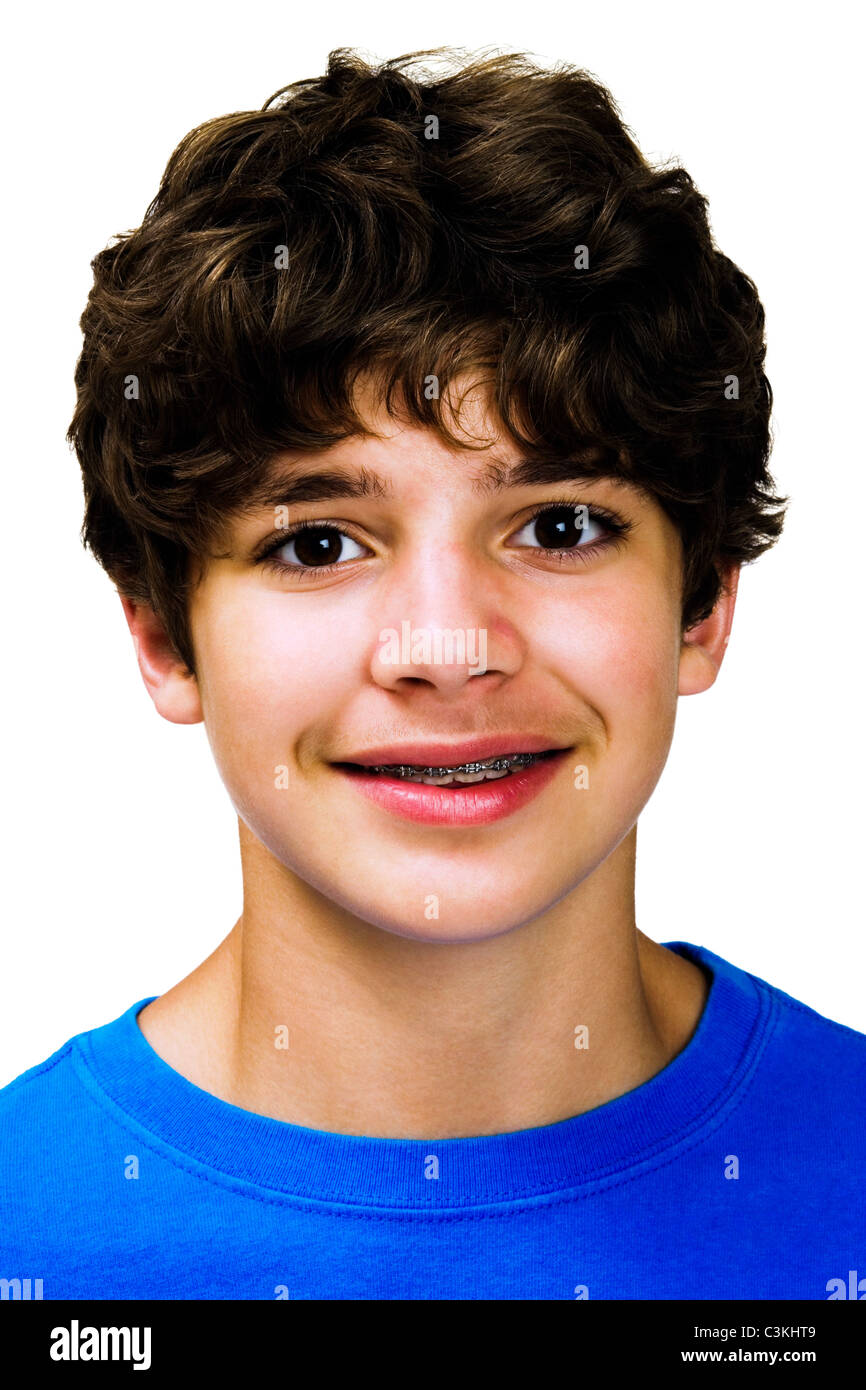 Confident boy posing and smiling isolated over white Stock Photo - Alamy