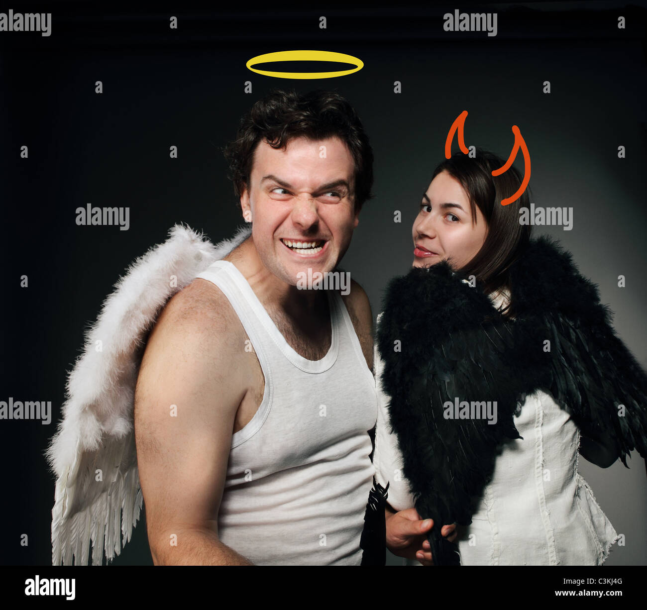 Mr. Angel and Mrs. Angel. Creepy character portrait Stock Photo - Alamy