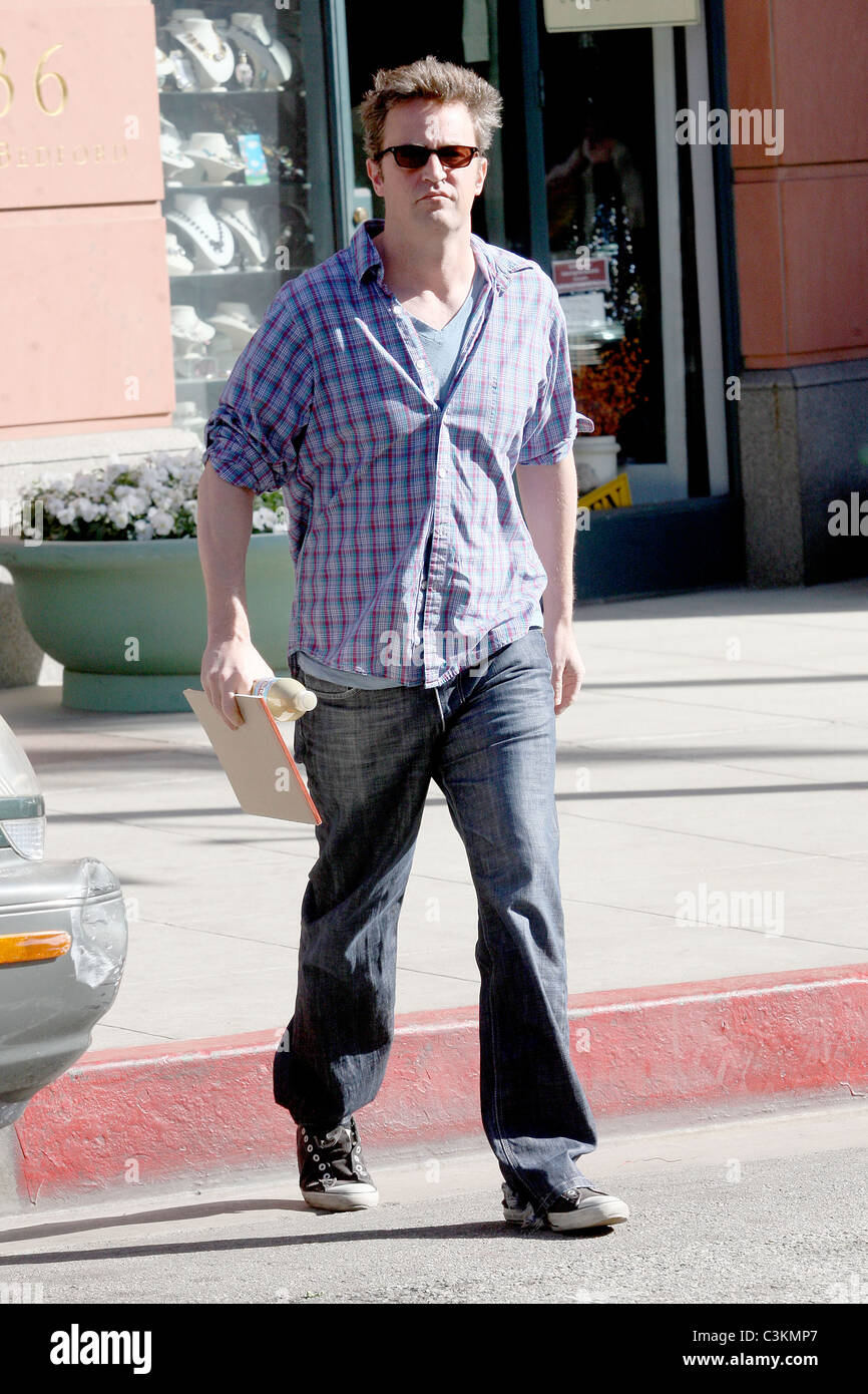 Matthew Perry holding a notebook while out and about in Beverly Hills ...