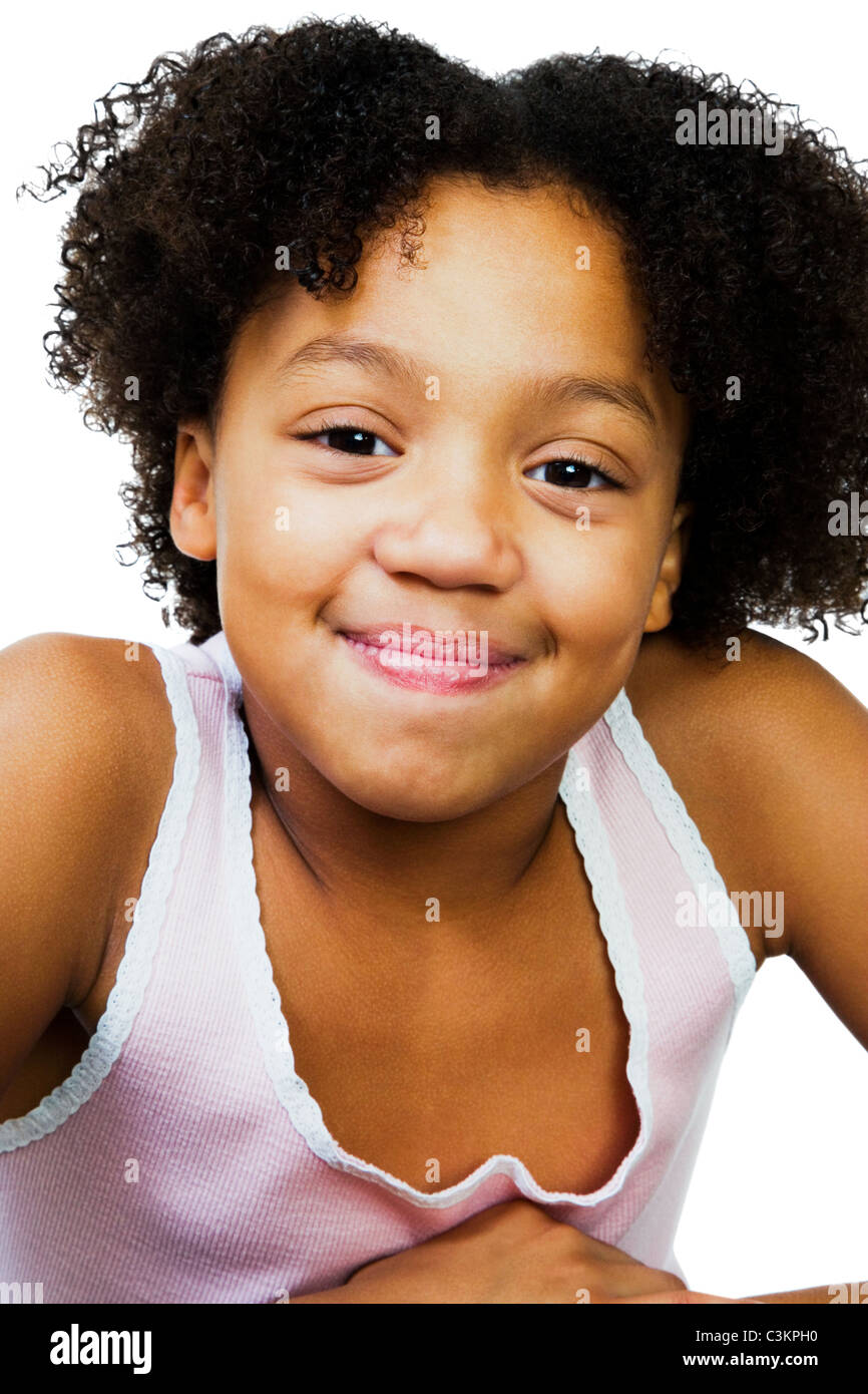 Beautiful girl smirking isolated over white Stock Photo - Alamy