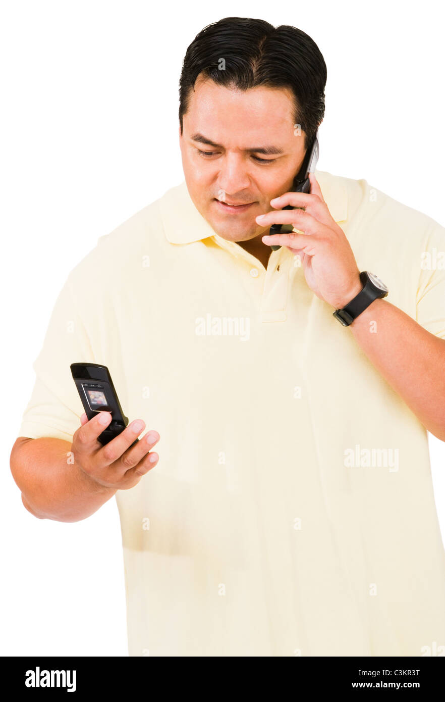 Mid adult man using a mobile phone isolated over white Stock Photo - Alamy