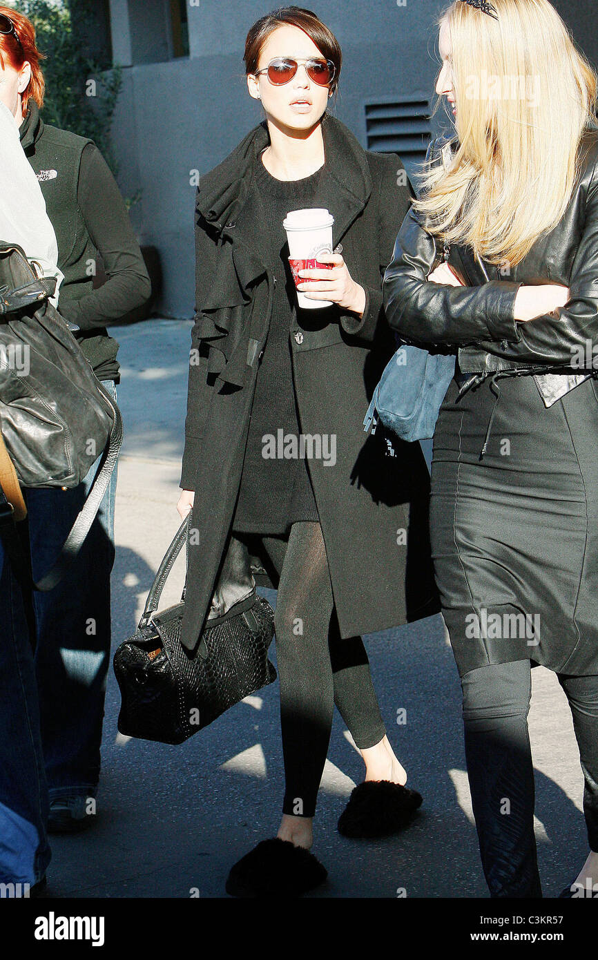 Jessica Alba drinking coffee from Coffee Bean & Tea Leaf during a break ...