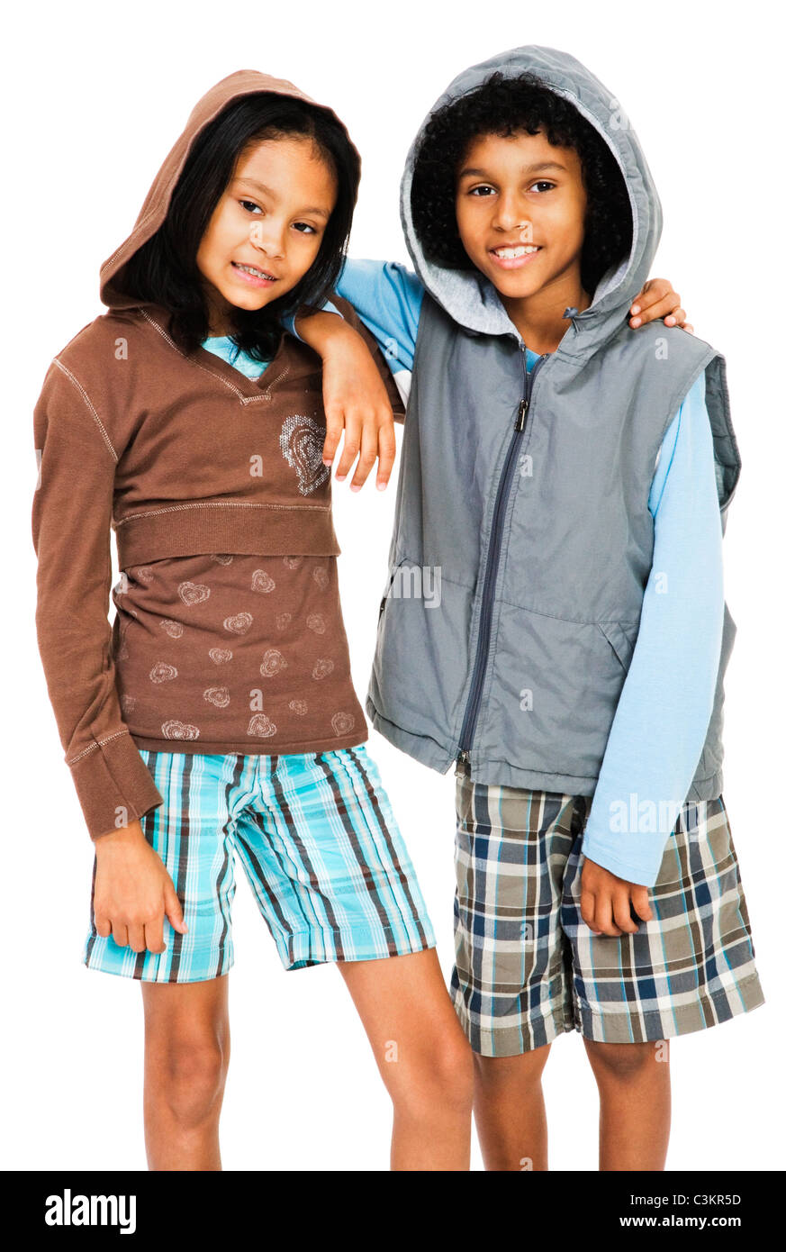 Two sisters standing together isolated hi-res stock photography and ...