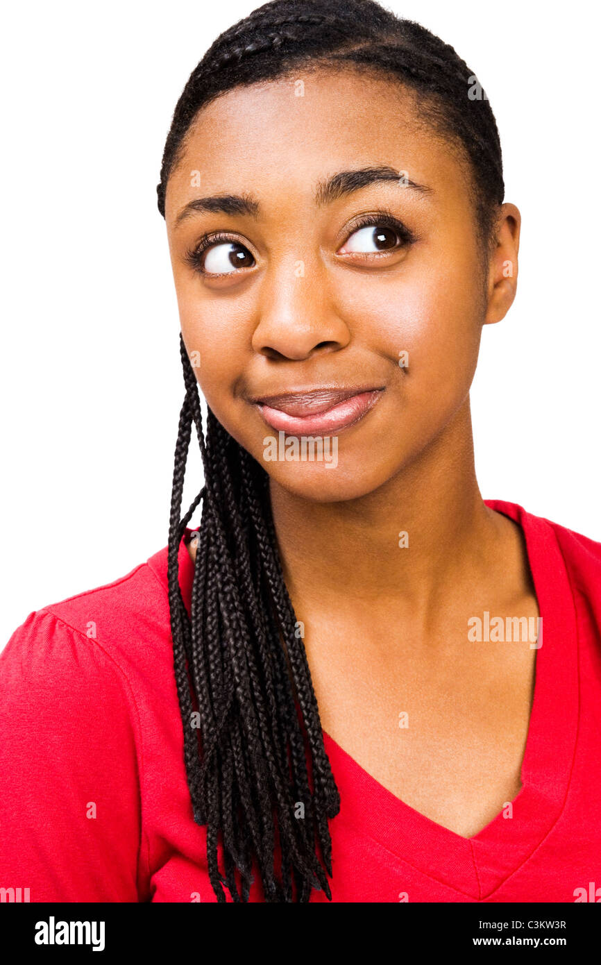 Happy teenage girl thinking isolated over white Stock Photo - Alamy