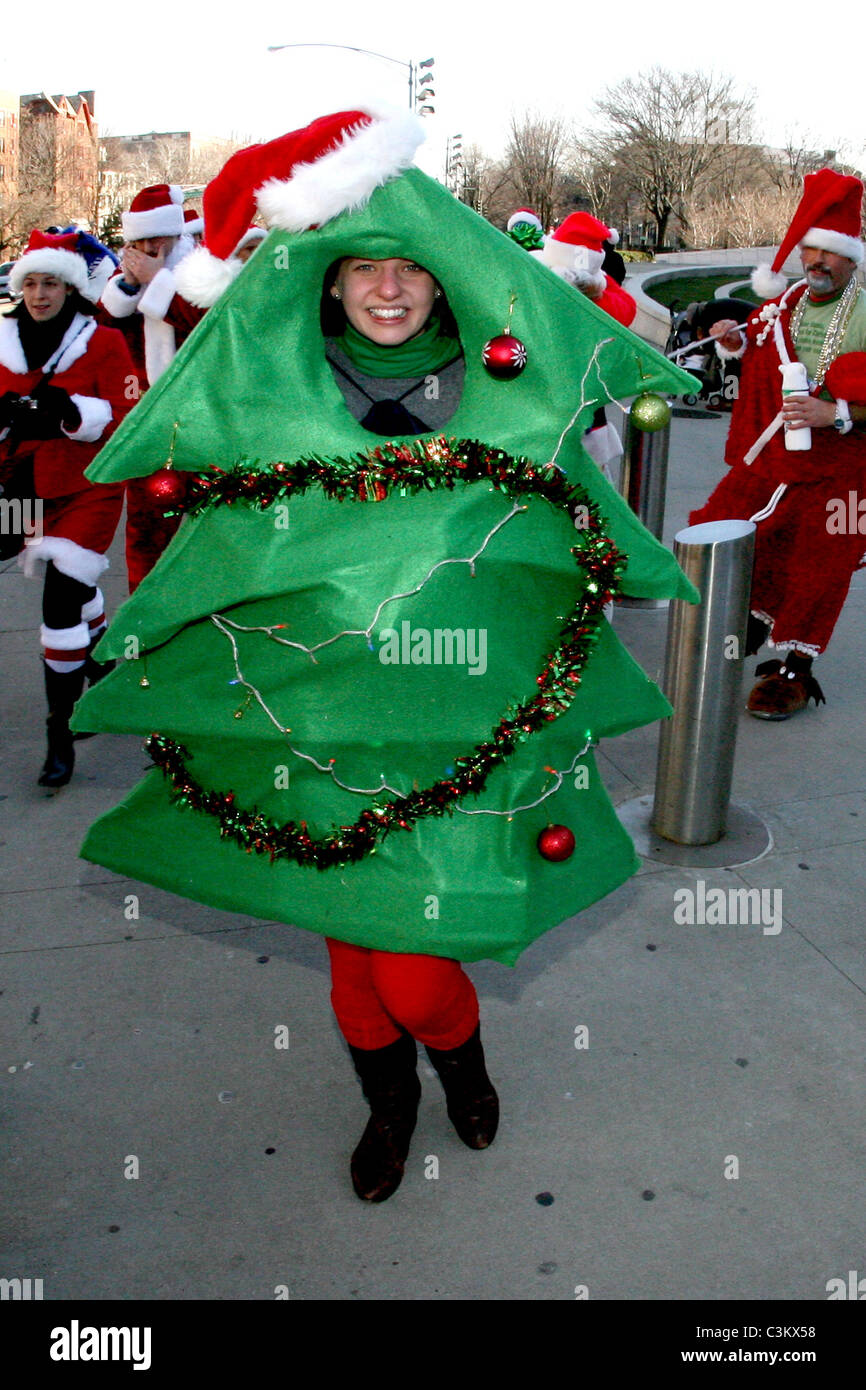 Santas meet in Brooklyn to participate in SantaCon 2009, en route to ...