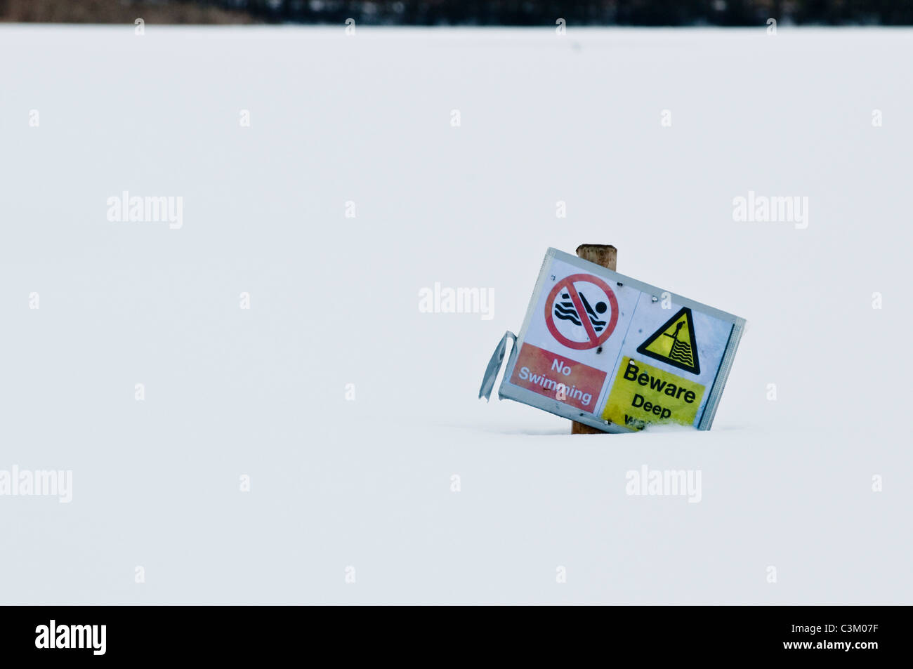 Danger Thin Ice signs over frozen water Stock Photo - Alamy