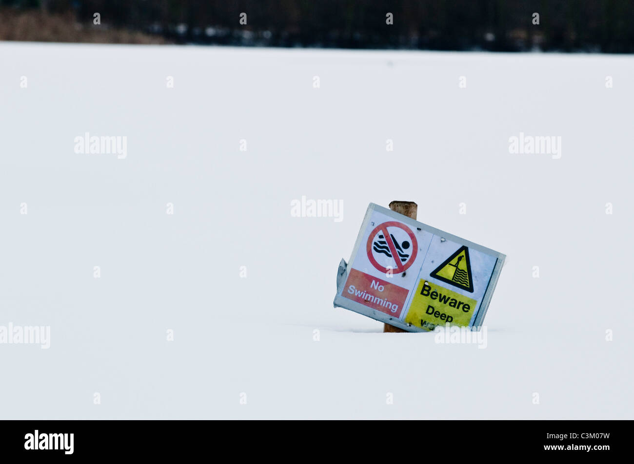 Danger Thin Ice signs over frozen water Stock Photo - Alamy