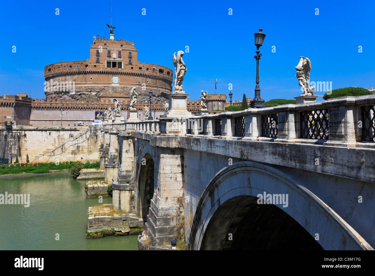 View of famous Sant Angelo Castle and Bridge across river Tiber in Rome ...