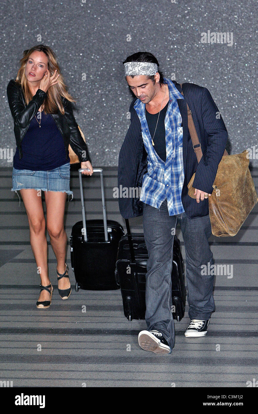 Colin Farrell and girlfriend Alicja Bachleda arrive at LAX airport ...