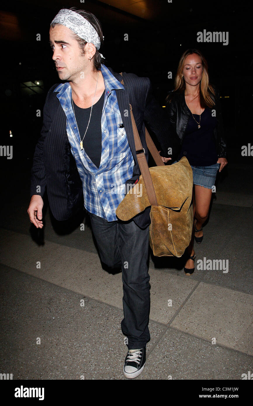 Colin Farrell and girlfriend Alicja Bachleda arrive at LAX airport ...