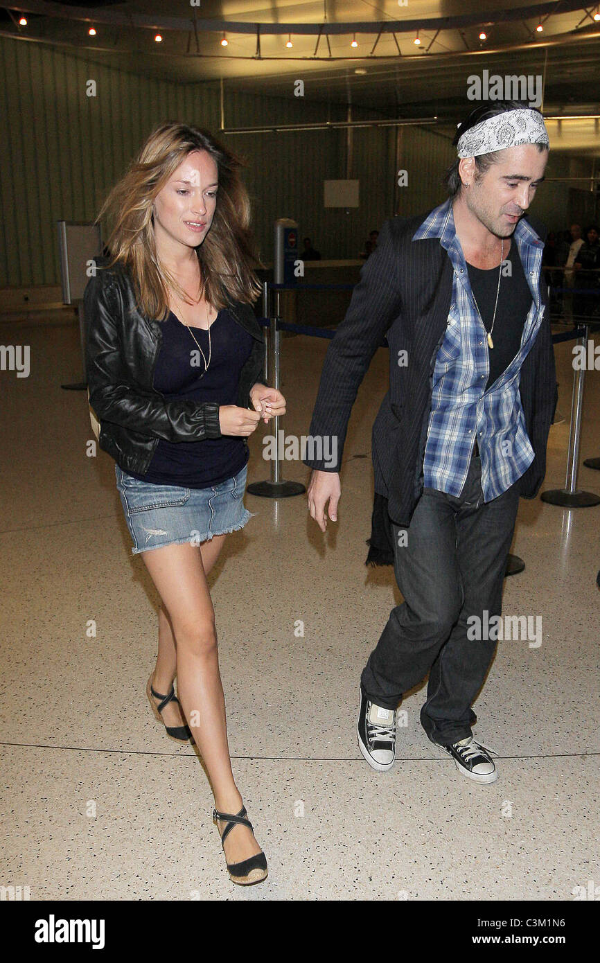 Colin Farrell and girlfriend Alicja Bachleda arrive at LAX airport ...