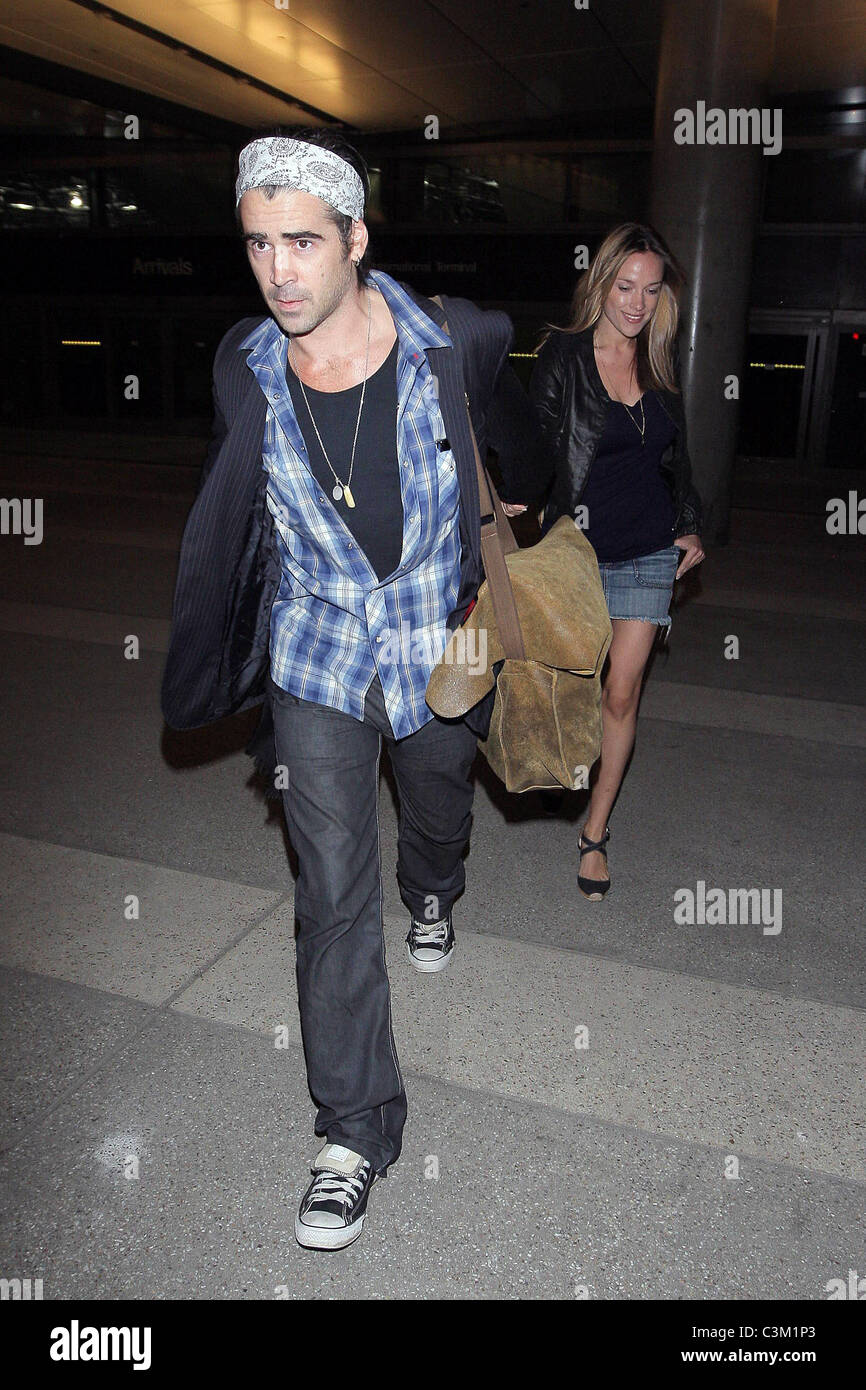 Colin Farrell and girlfriend Alicja Bachleda arrive at LAX airport ...