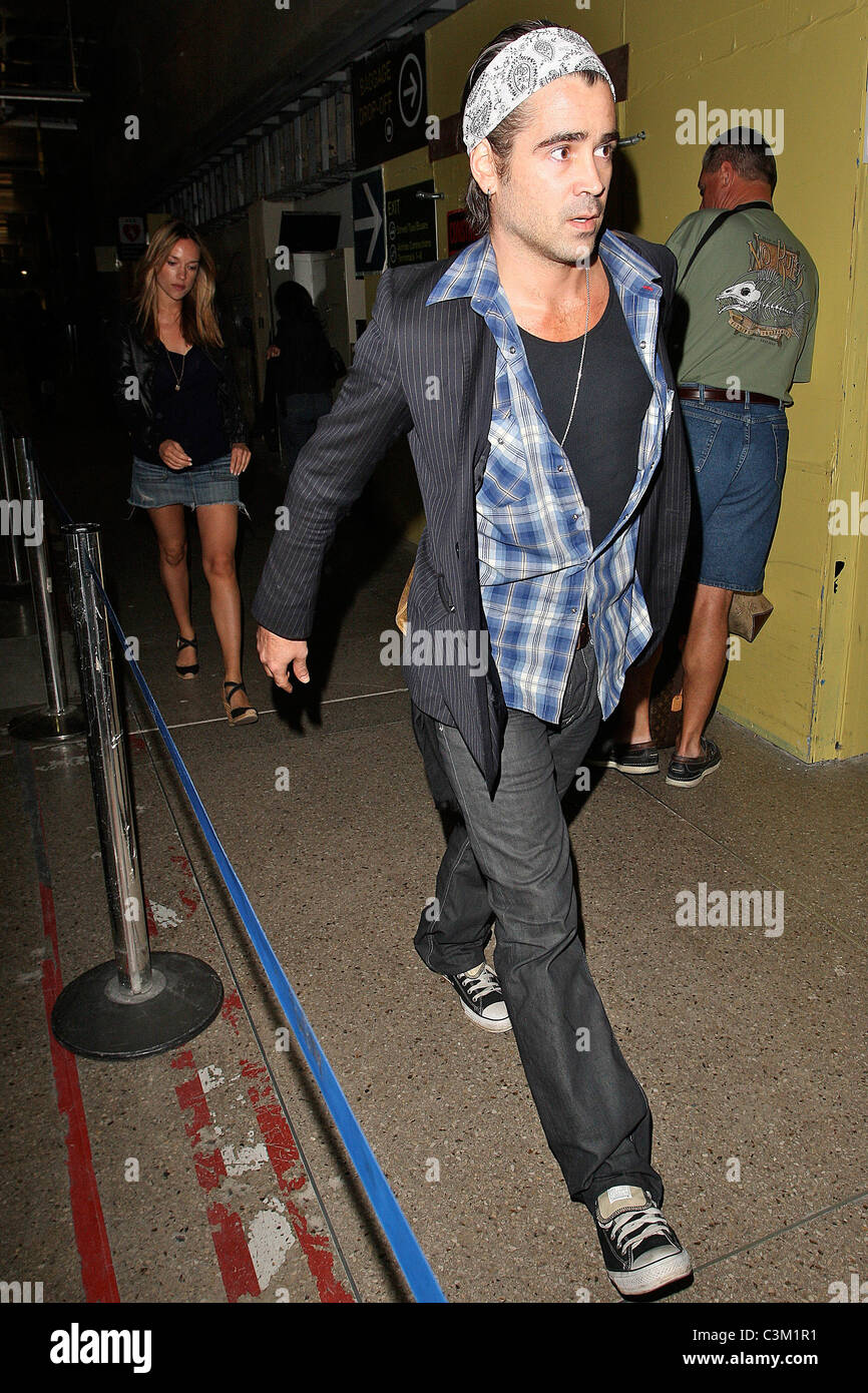 Colin Farrell and girlfriend Alicja Bachleda arrive at LAX airport ...