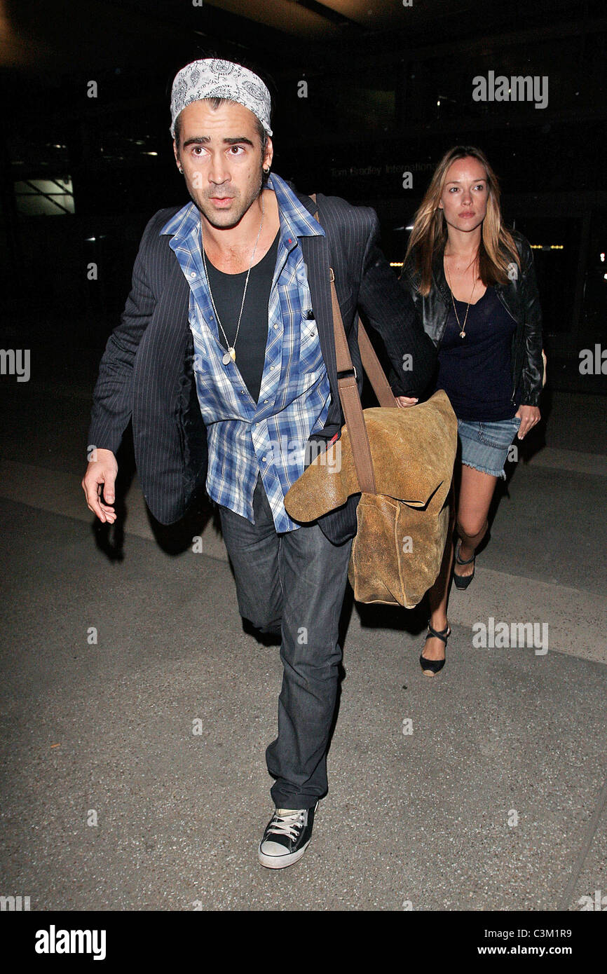 Colin Farrell and girlfriend Alicja Bachleda arrive at LAX airport ...