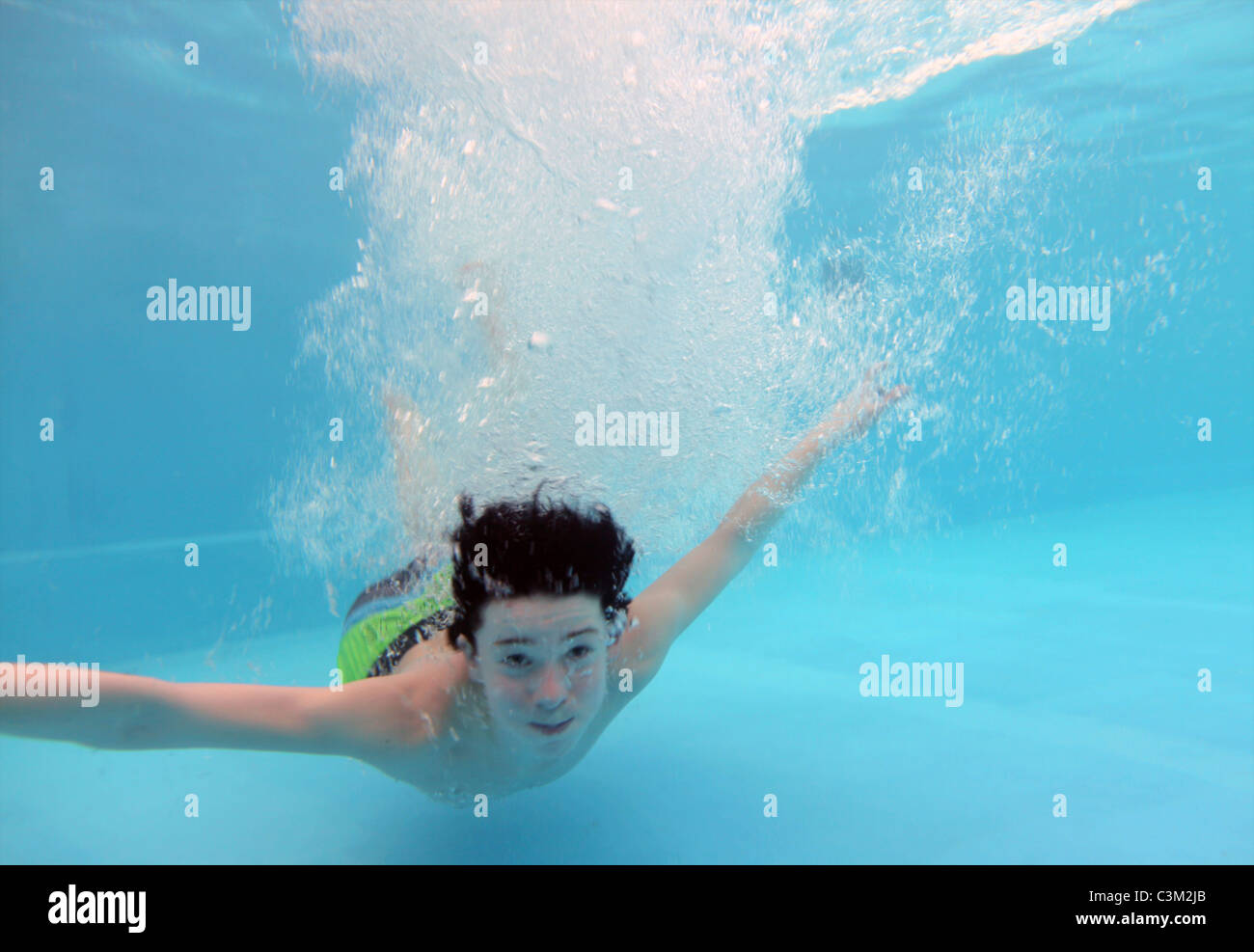 Swimming in swimming pool hi-res stock photography and images - Alamy