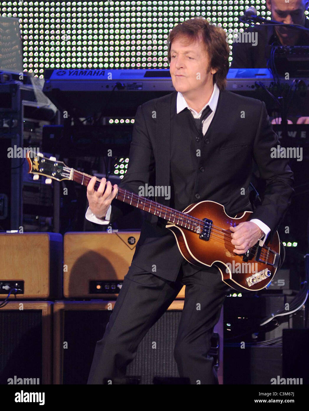 Singer Paul McCartney performing live on stage at The O2 Arena during ...
