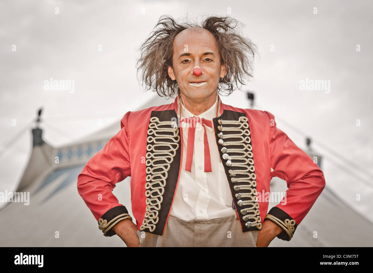 Circus clown outside big top Stock Photo - Alamy