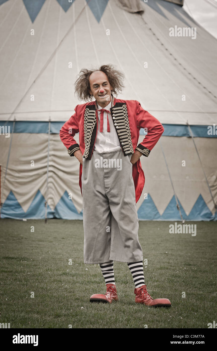 Circus clown outside big top Stock Photo - Alamy