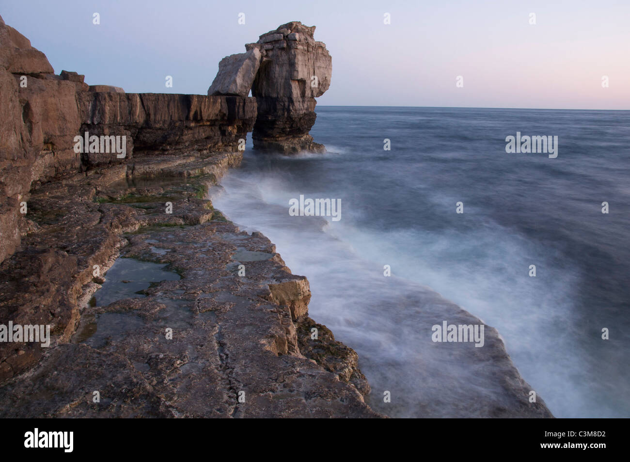 Pulpit Rock in a stormy sea. This massive limestone stack stands just ...