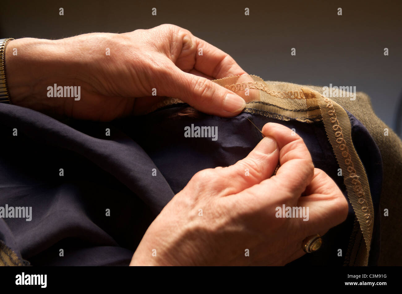 Repairing clothing sewing hi-res stock photography and images - Alamy